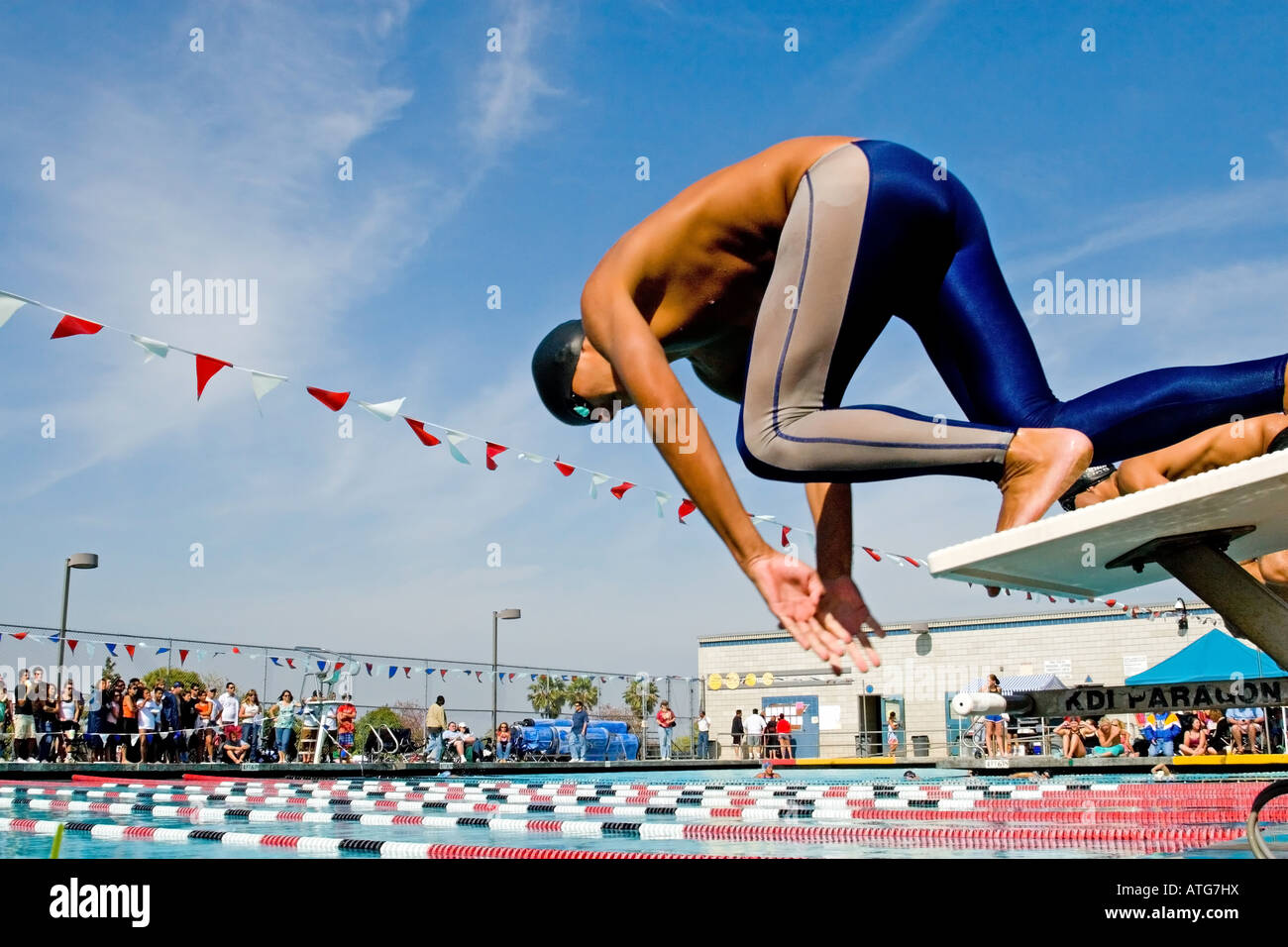 Swimmers and their competition in the pool Stock Photo - Alamy