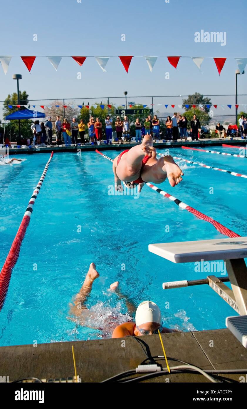 Swimmers and their competition in the pool Stock Photo - Alamy