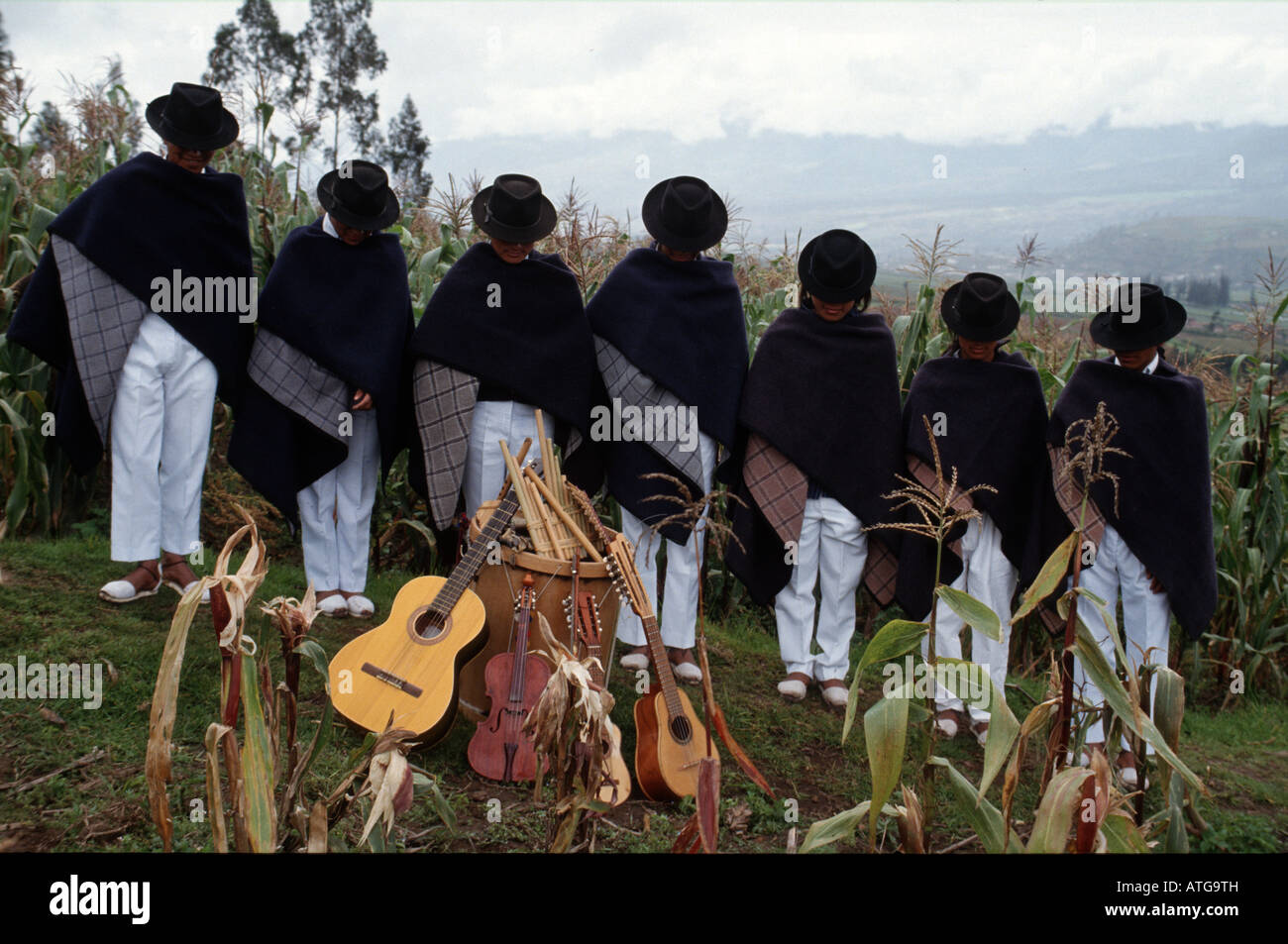Andean musicians looking down at their instruments from Otavalo ...