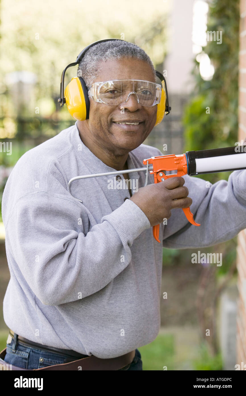 Mature african american man hearing hi-res stock photography and images - Alamy