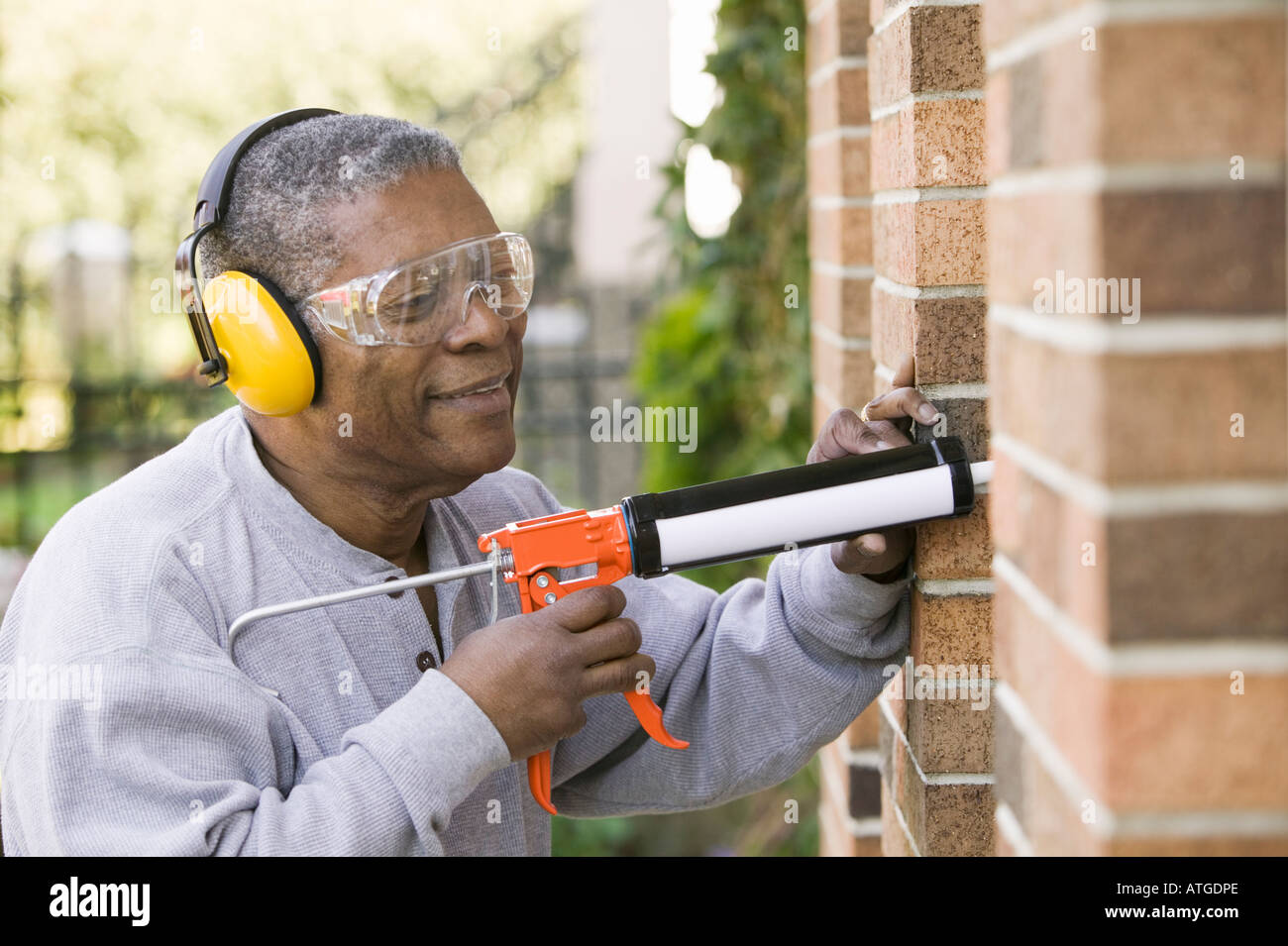 Mature african american man hearing hi-res stock photography and images - Alamy