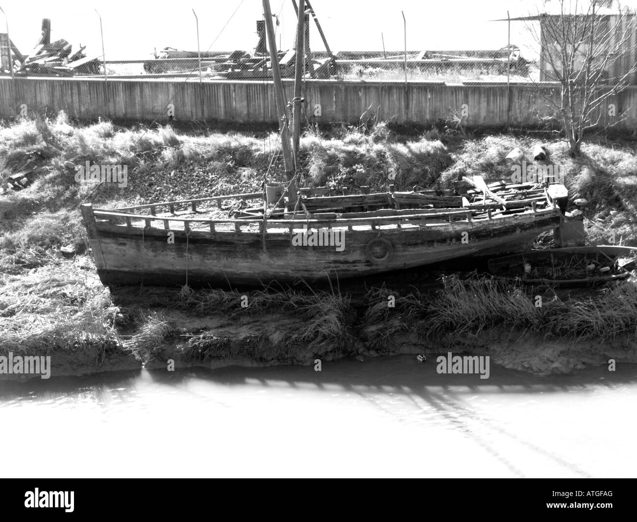 Fishing boat up on Black and White Stock Photos & Images - Alamy