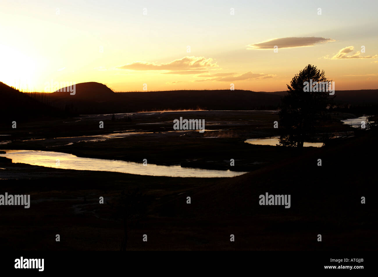 sunset at yellowstone Stock Photo - Alamy