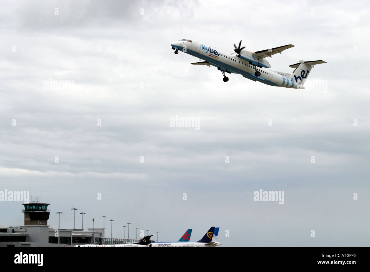 Flybe turbo prop plane taking off from Leeds Bradford Airport Stock ...