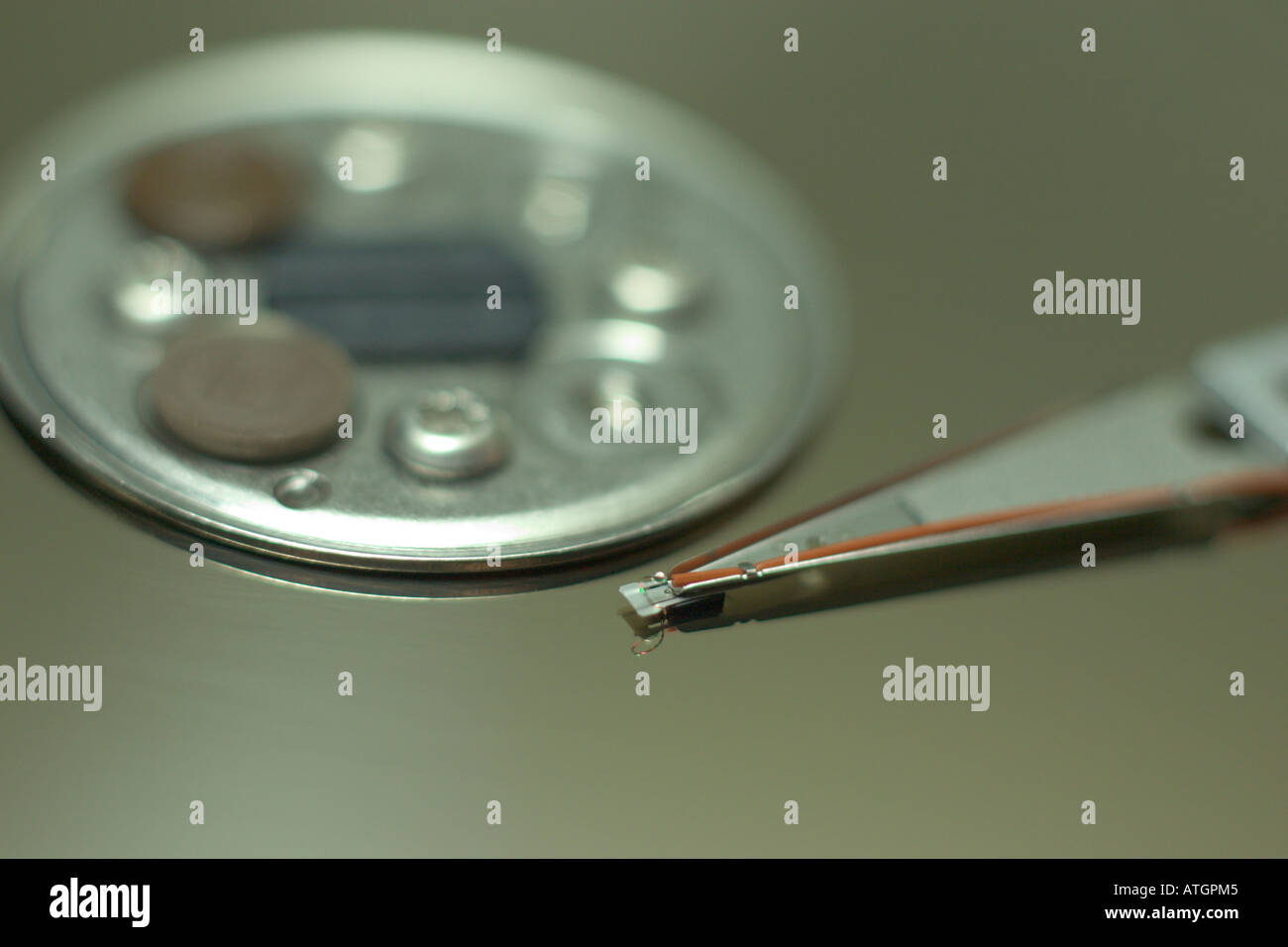 close up of hard disk drive read write head Stock Photo - Alamy