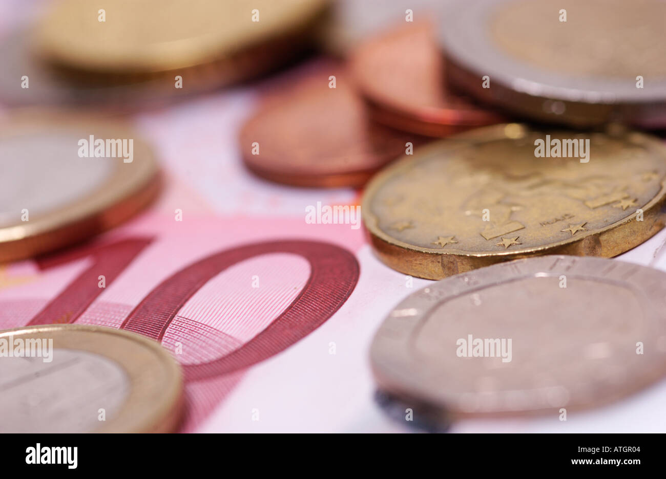 Euro notes and coins Stock Photo - Alamy
