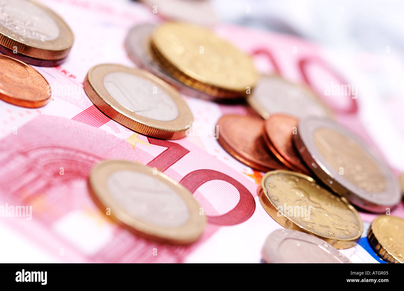 Euro notes and coins Stock Photo - Alamy