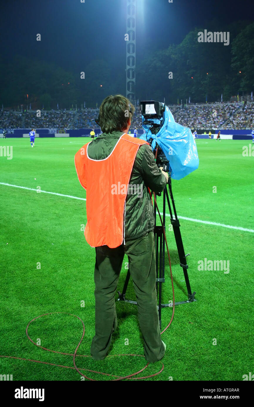 Cameraman operator on the stadium Stock Photo - Alamy