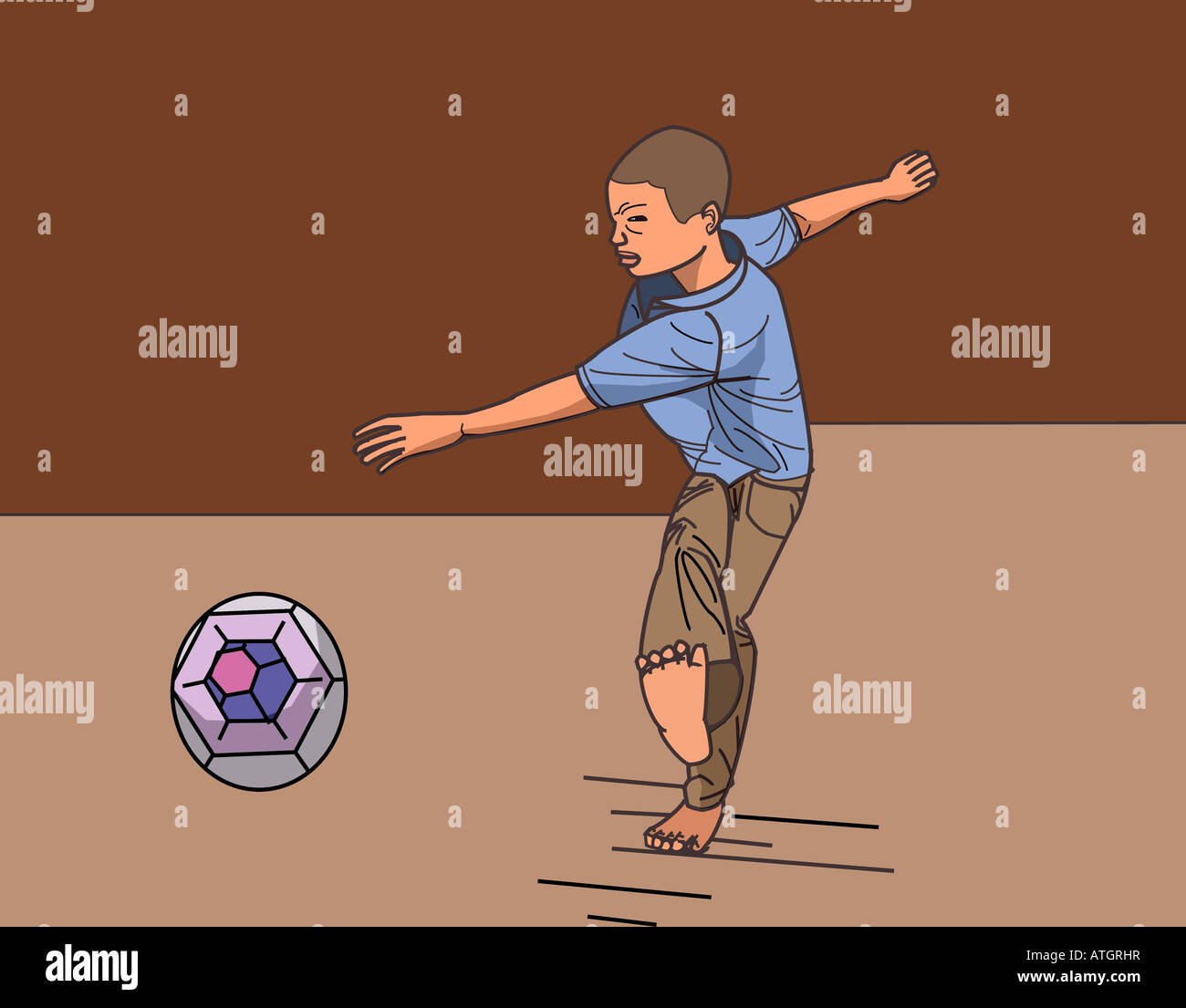 a young boy who missed soccer kicks a soccer ball while playing at the ...