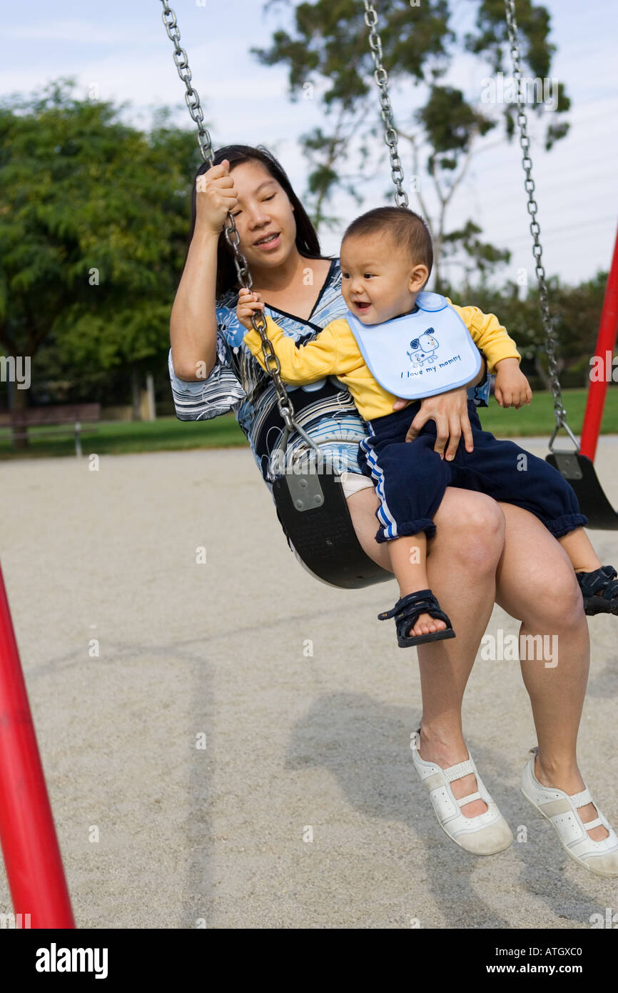 Kid sitting on mom lap hi-res stock photography and images - Alamy