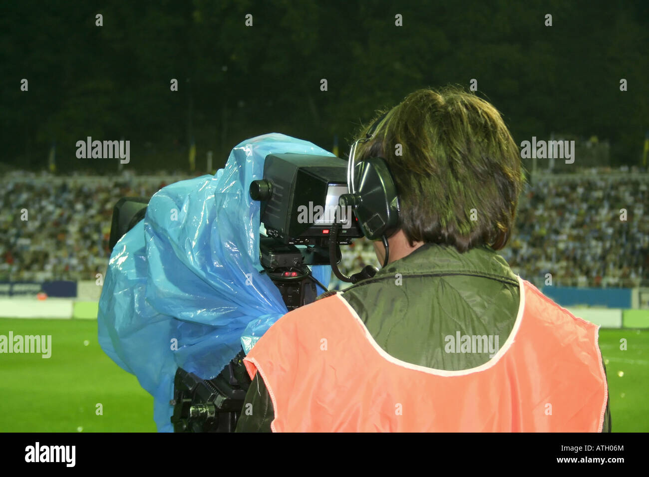 Cameraman operator on the stadium Stock Photo - Alamy