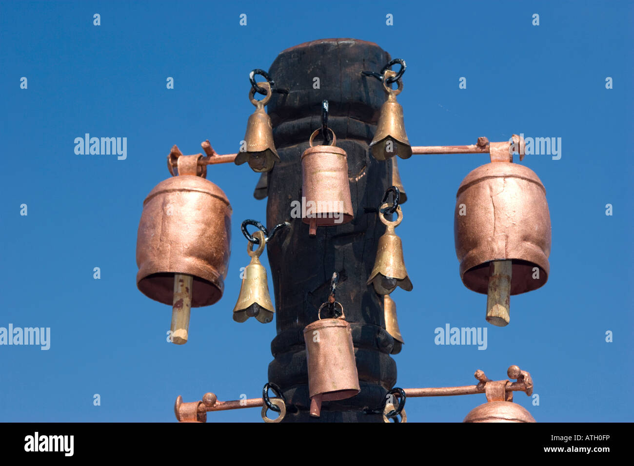 Copper bells on a stick Stock Photo - Alamy