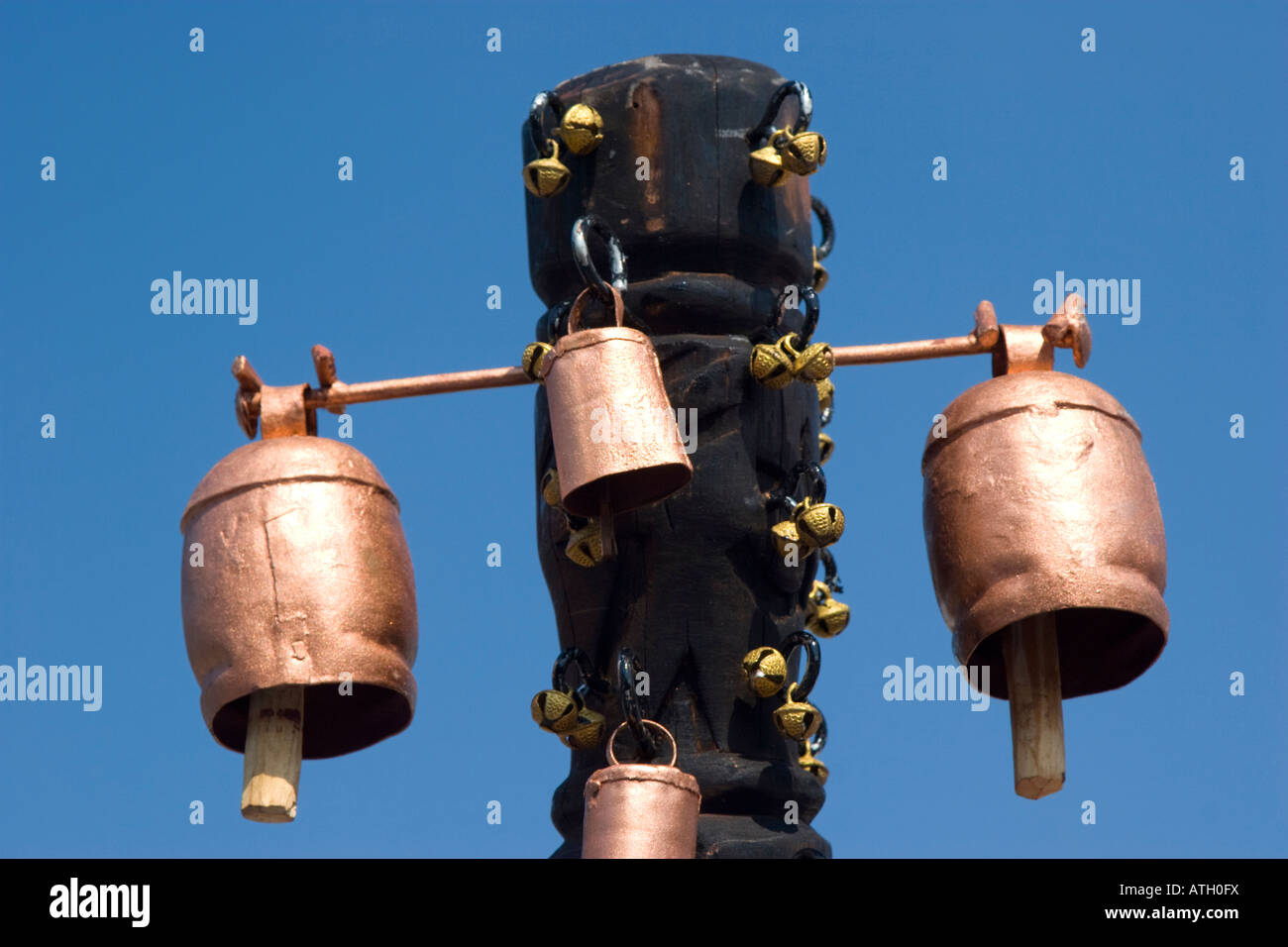 Copper bells on a stick Stock Photo - Alamy