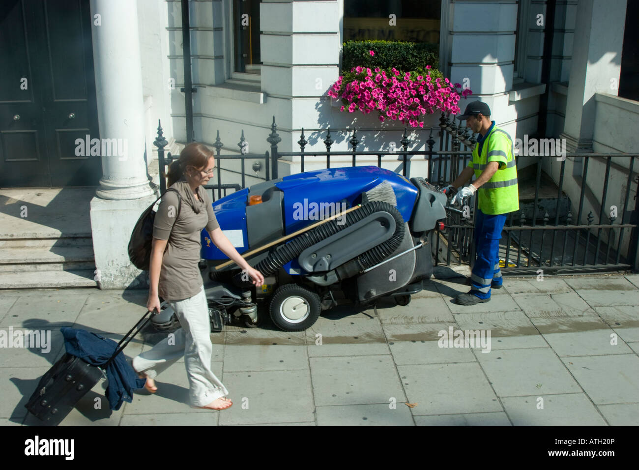 Sweeper lady hi-res stock photography and images - Alamy