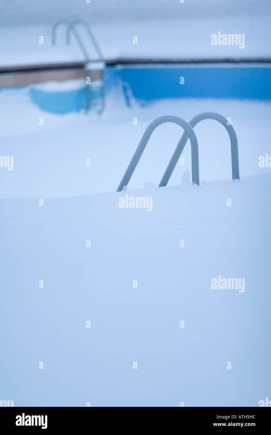 Swimming pool covered in snow Stock Photo - Alamy