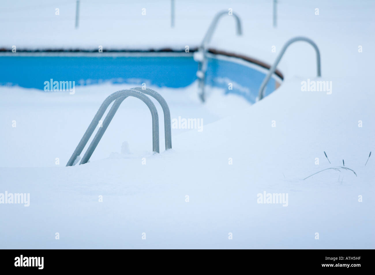 Swimming pool covered in snow Stock Photo - Alamy