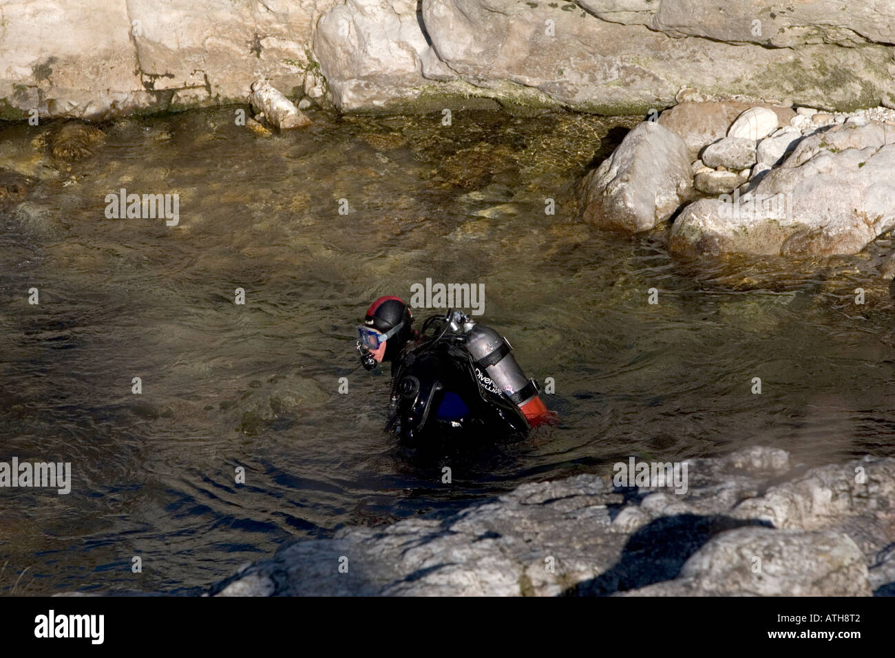 Scuba diver in river Stock Photo - Alamy