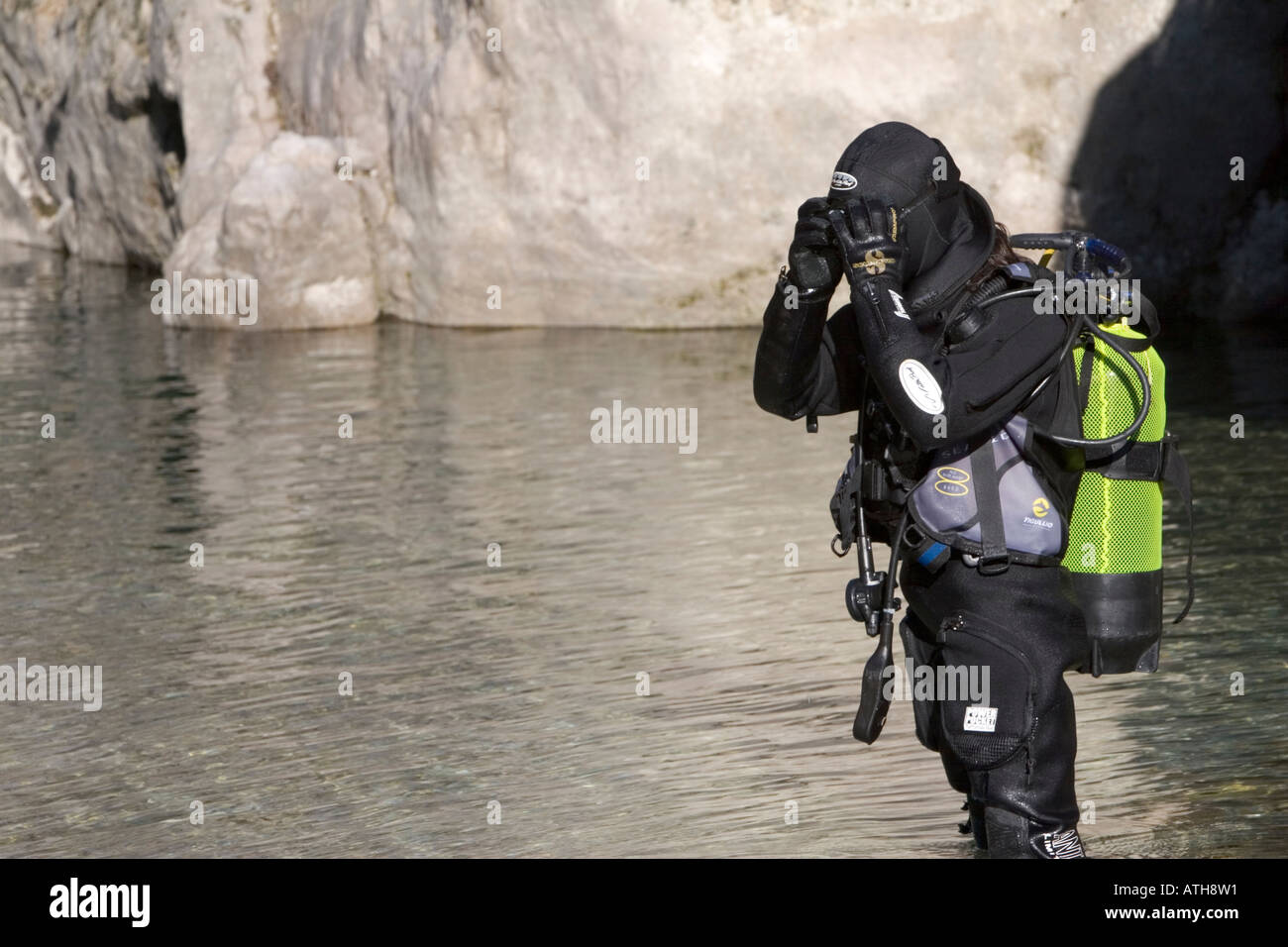 Scuba diver standing in river Stock Photo - Alamy Scuba diver standing in river Stock Photo - Alamy
