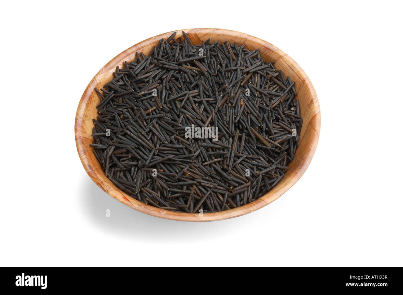 Wild Rice in bowl on white background Stock Photo - Alamy
