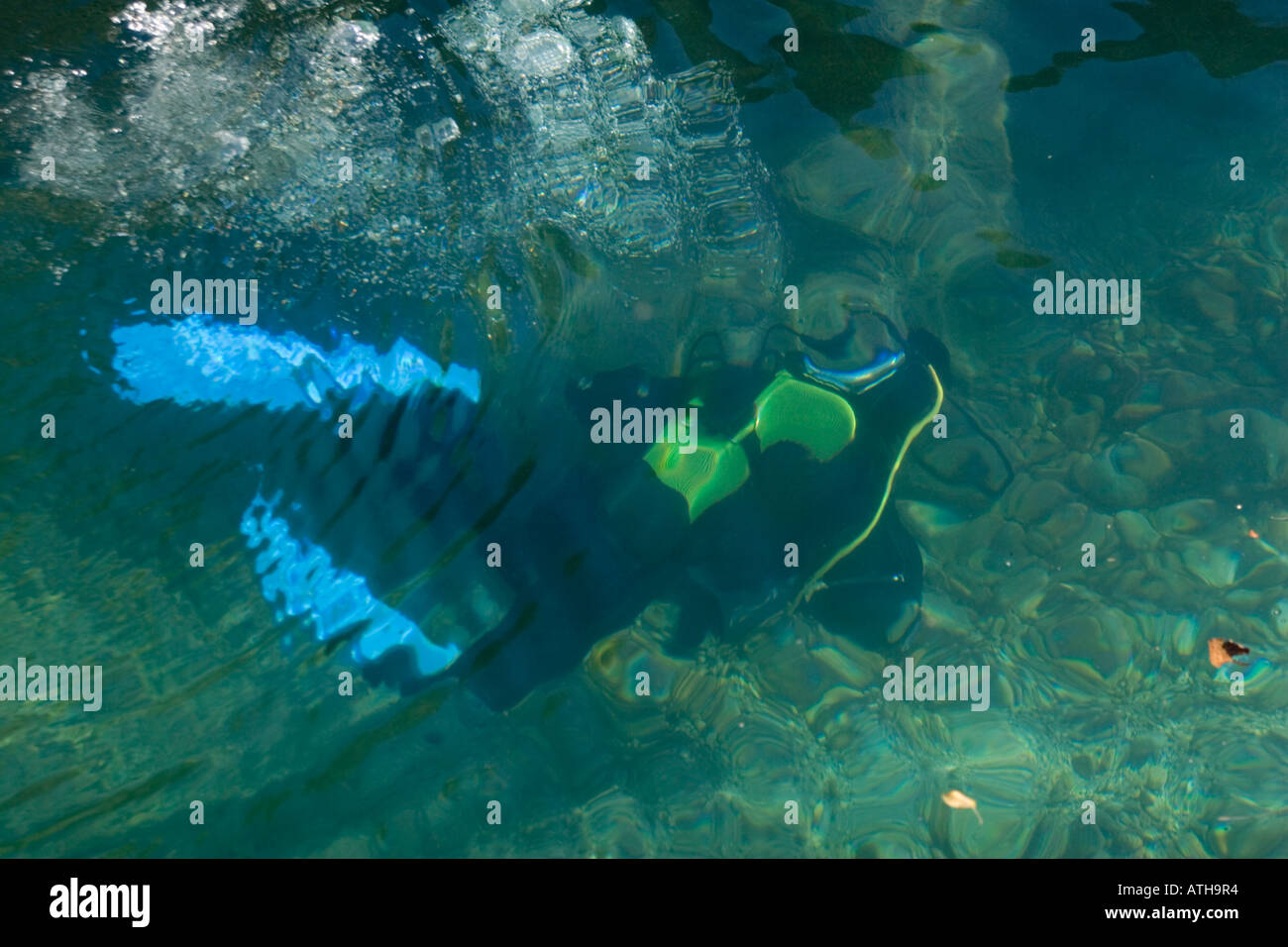 Sub aqua diver in shallow mountain river Stock Photo - Alamy