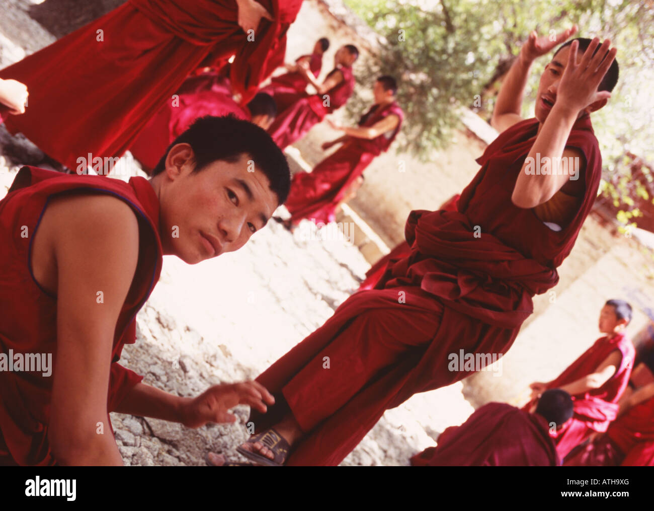 Tibetan monks debating, Deprung monastery Stock Photo - Alamy