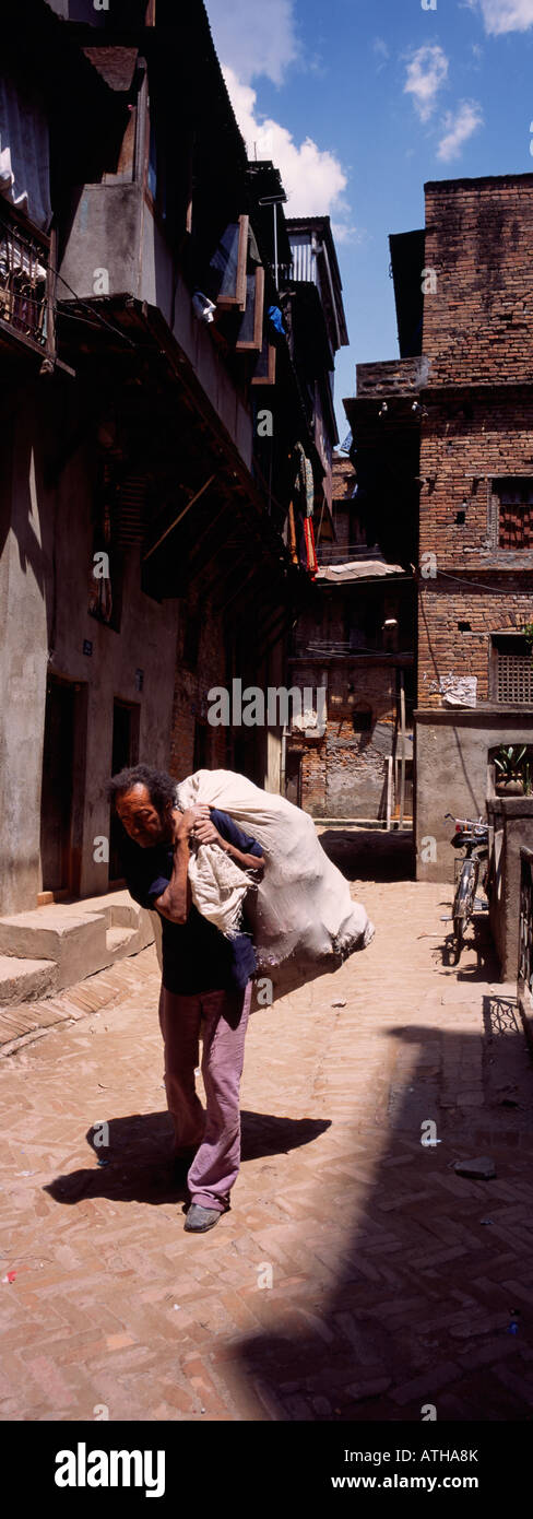 Man with big bag india hi-res stock photography and images - Alamy