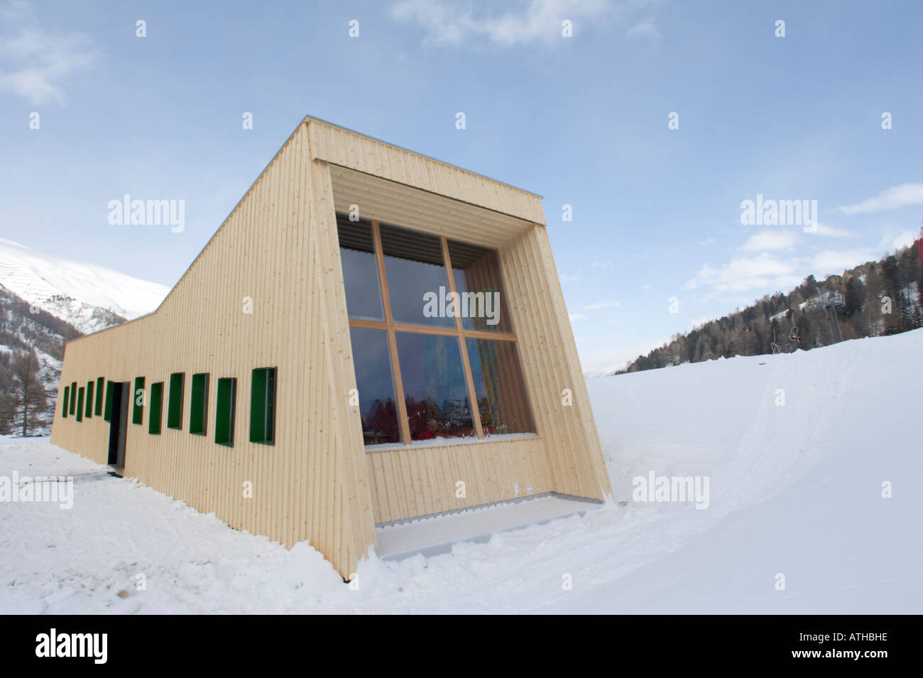 Windows of contemporary design of timber constructed ski hut, South ...