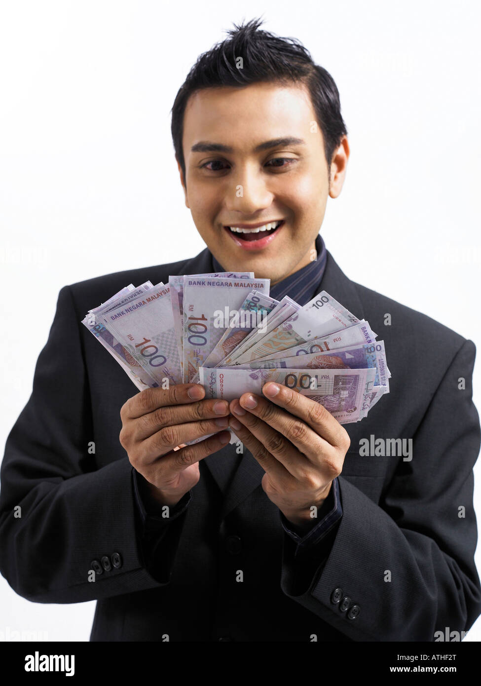 businessman holding money Stock Photo - Alamy