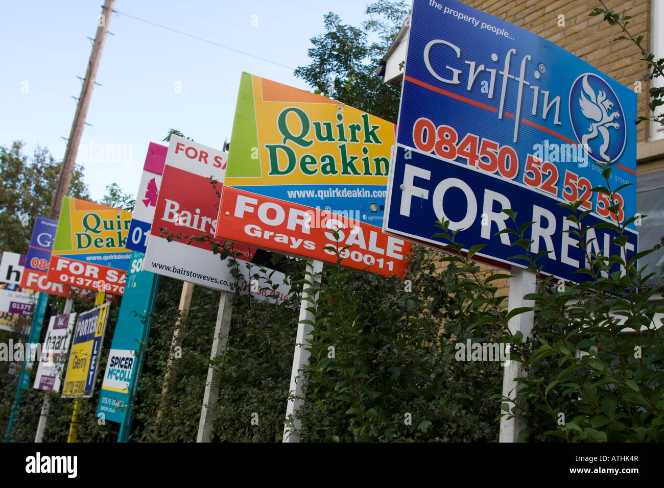 Multiple estate agents boards To Let and For Sale Signs outside Private ...