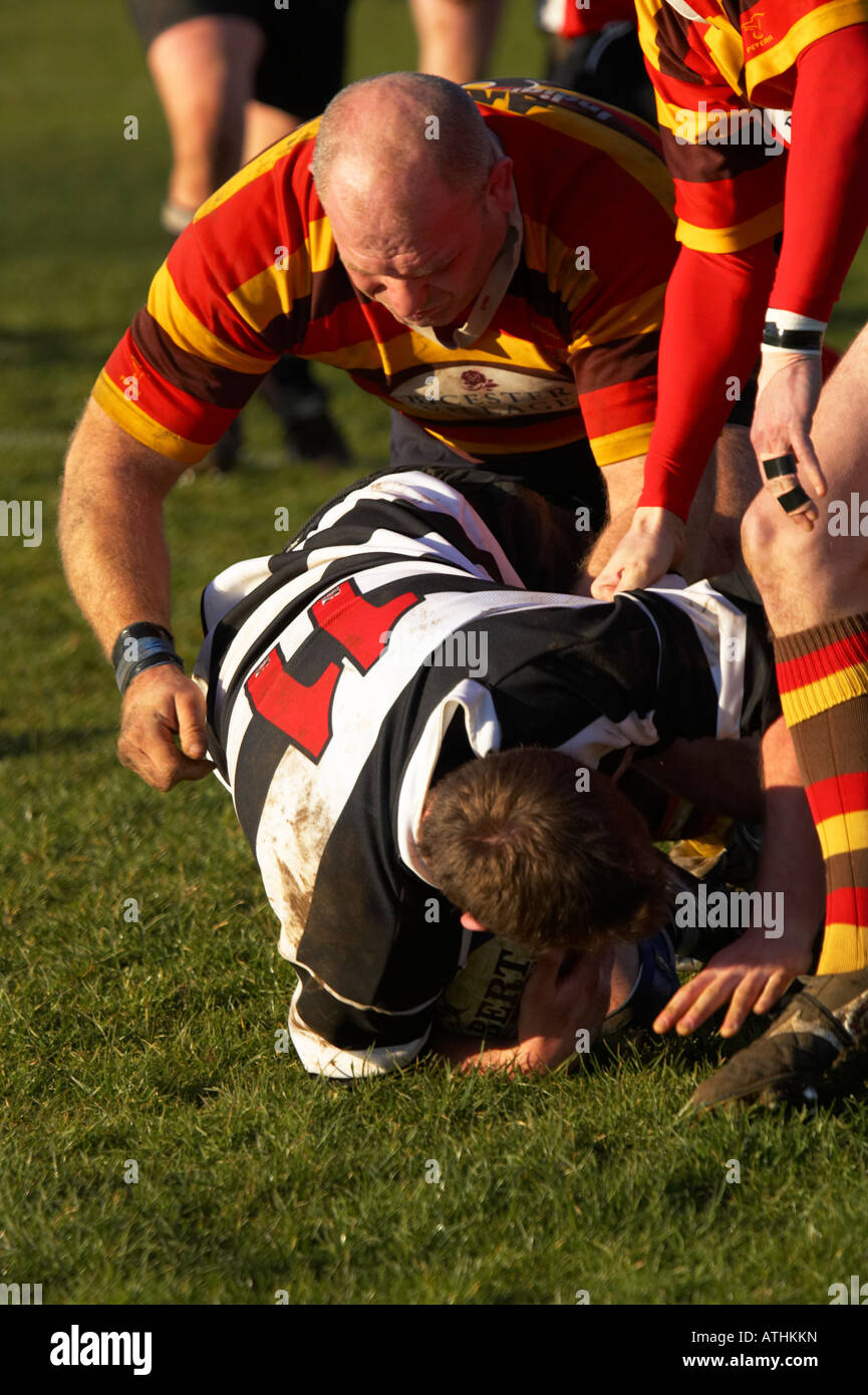 Bicester rugby player making a tackle Stock Photo - Alamy
