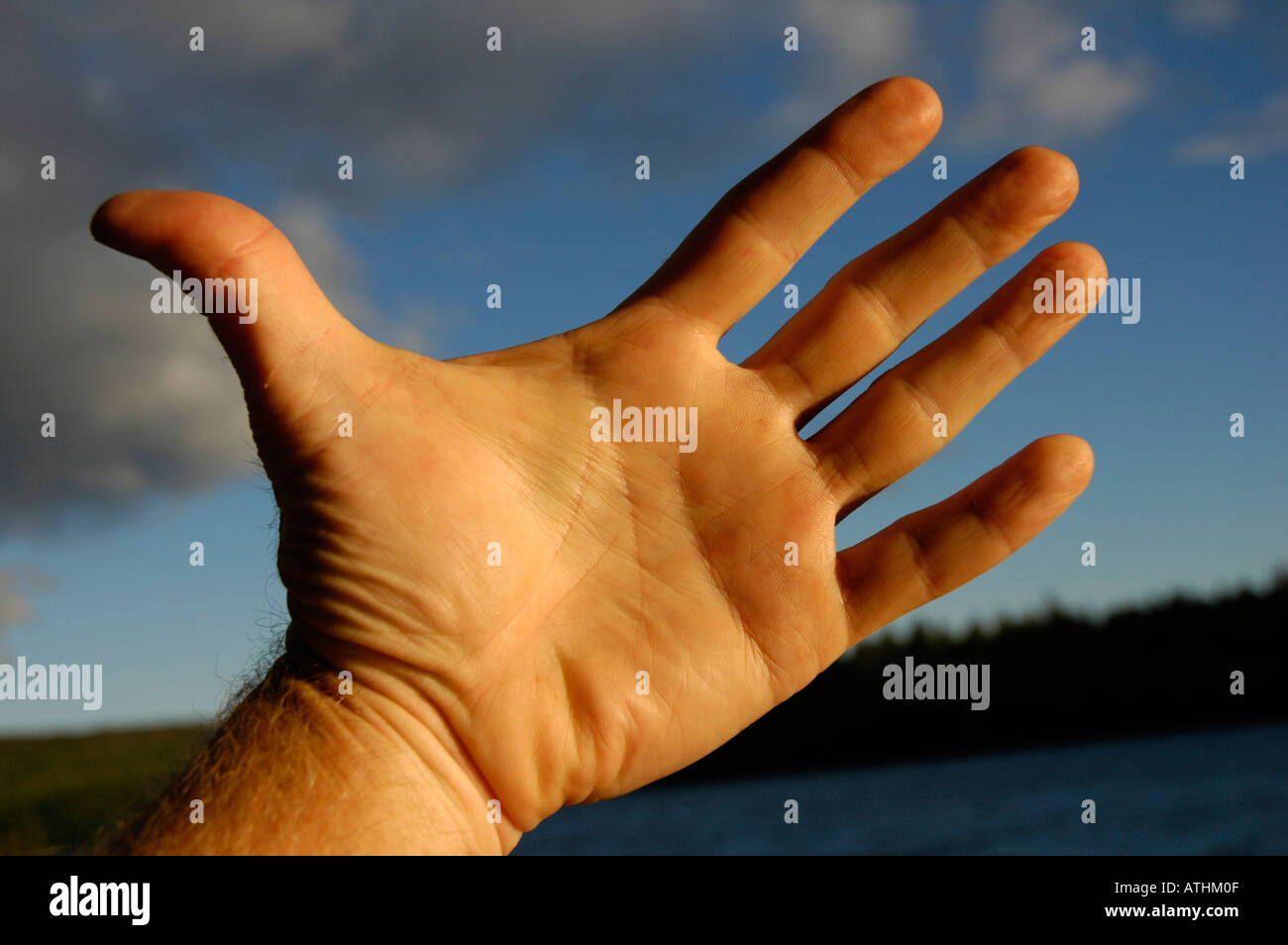 Stretched his hand to the sky hi-res stock photography and images - Alamy