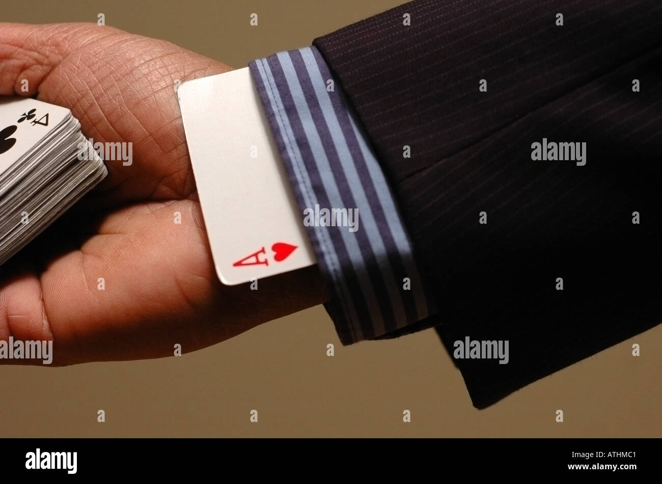 Playing cards ace hand sleeve hi-res stock photography and images - Alamy