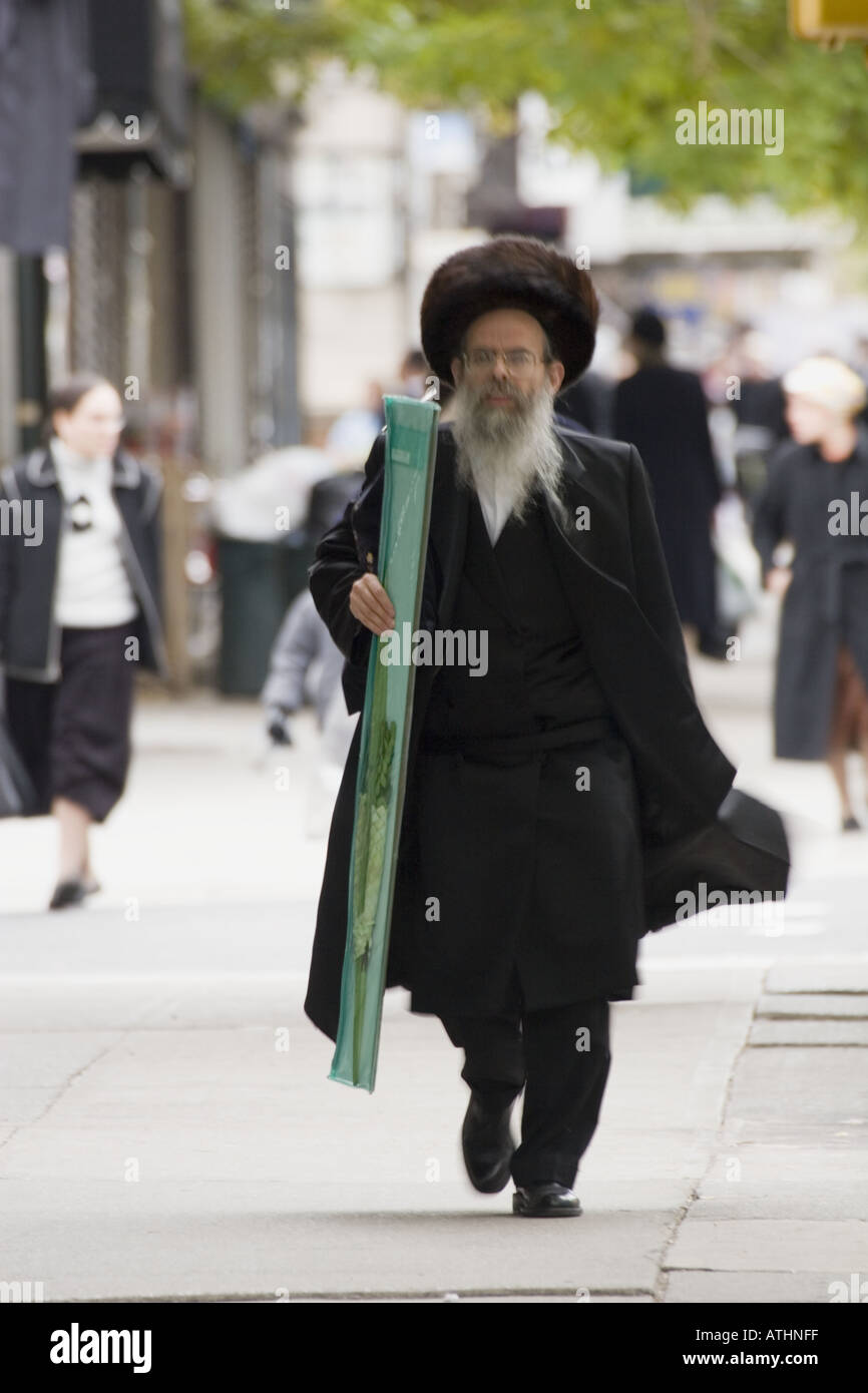 Hasidic man carrying lulav last hi-res stock photography and images - Alamy
