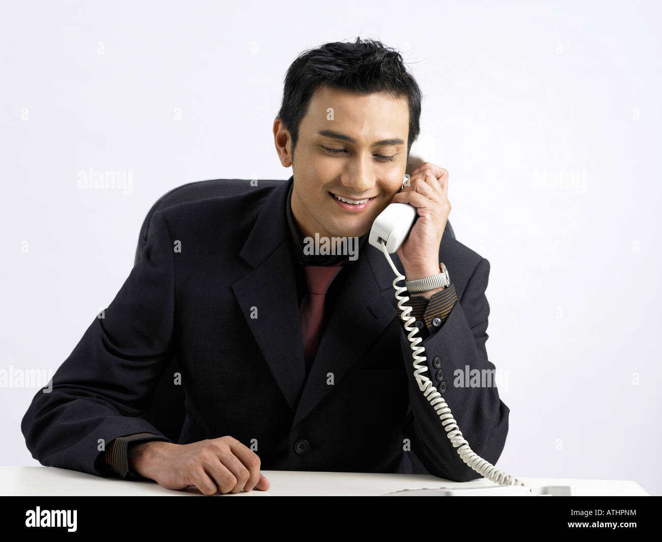 businessman using telephone Stock Photo - Alamy