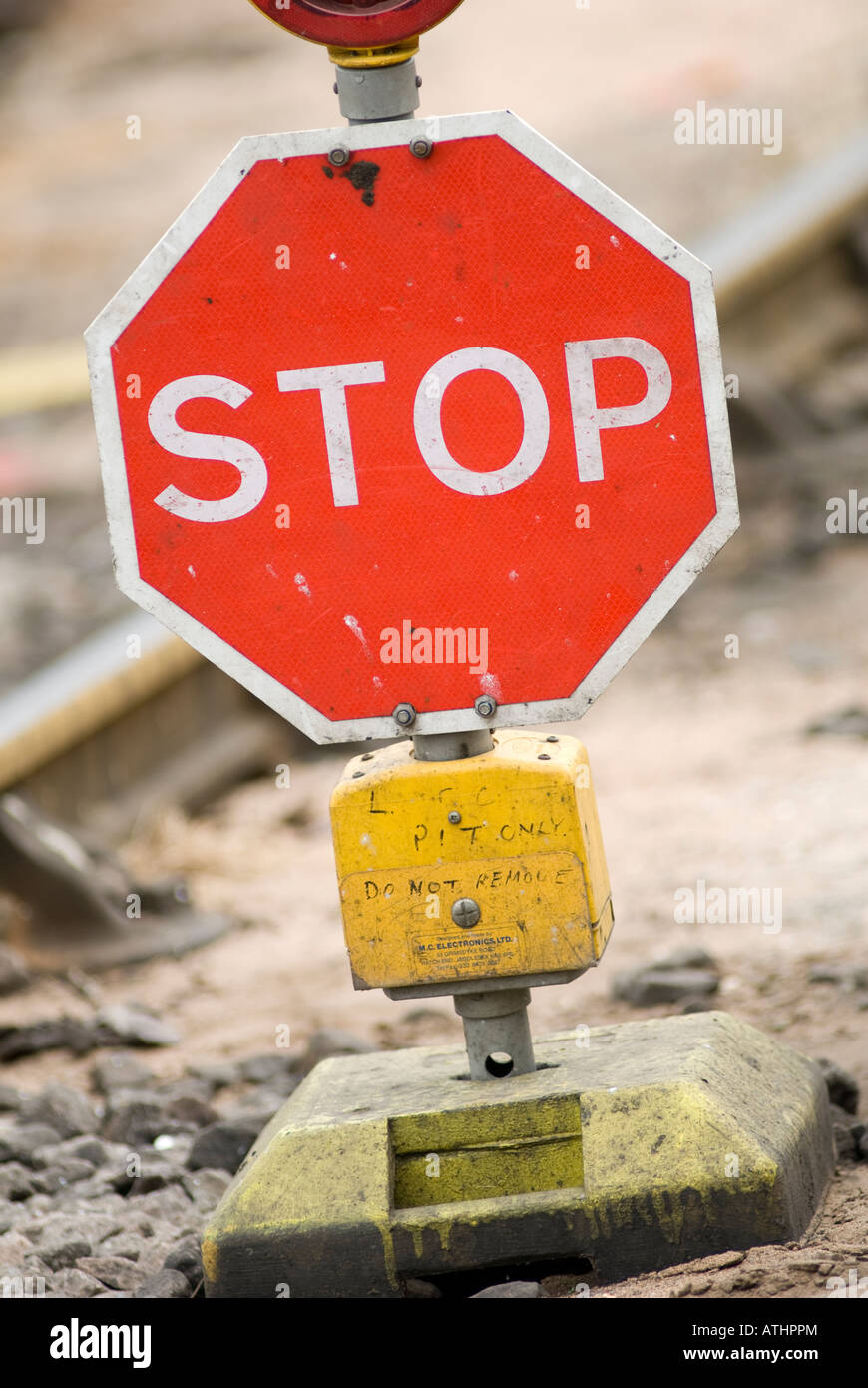 stop sign at a railway freight depot in the uk Stock Photo - Alamy