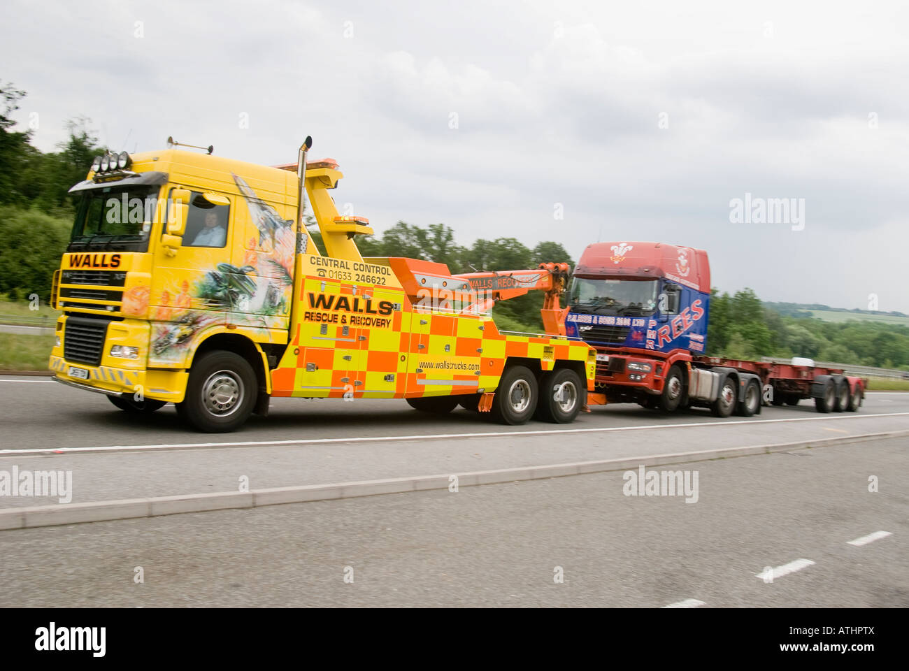 daf recovery vehicle towing a lorry on a british dual carriageway Stock ...