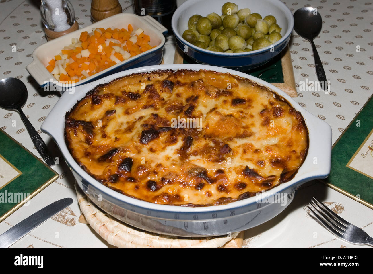 Dish of freshly cooked lasagne taken straight out of the Aga ready to ...