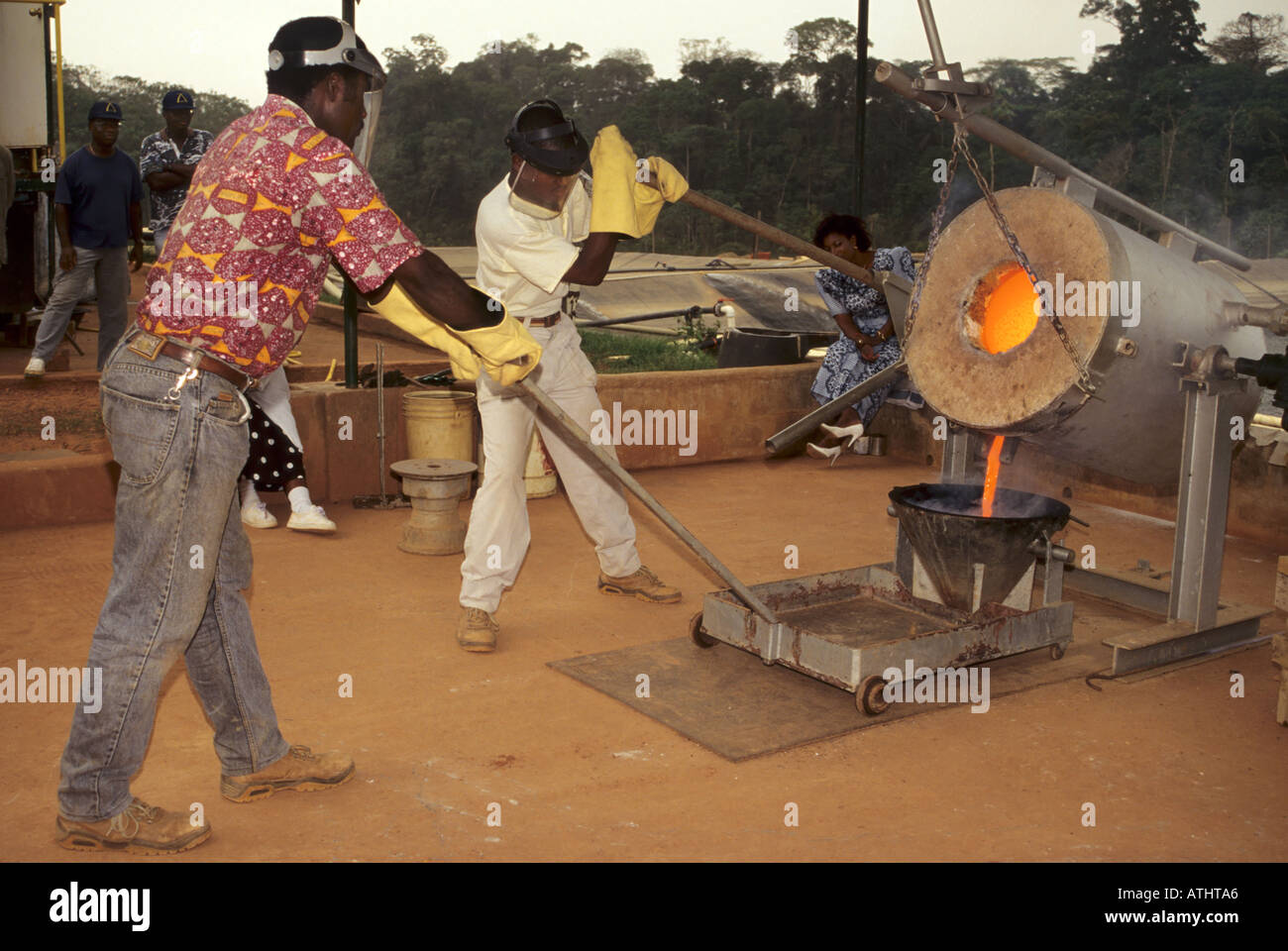 Workers Pour Gold Ingot, Two Weeks' Production, SOMIAF Gold Mine, Ivory ...