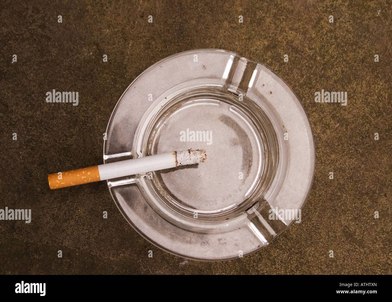 Cigarette in ashtray Stock Photo - Alamy
