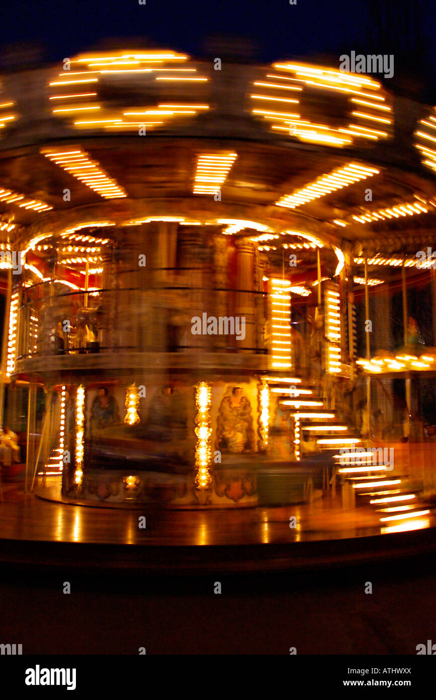 trails of light of a carousel rotating Stock Photo - Alamy