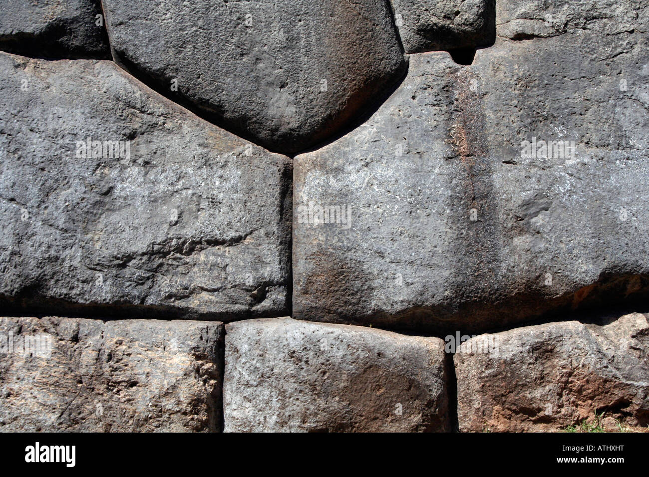 Inca carved stone walls at the military fort of Sacsayhuaman ruins in ...