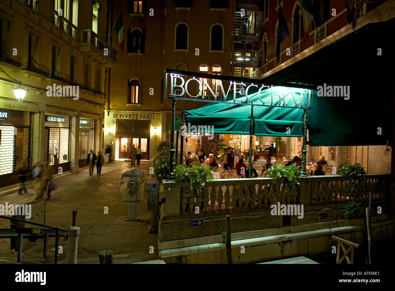 Open air restaurant at night in Venice Italy Stock Photo - Alamy