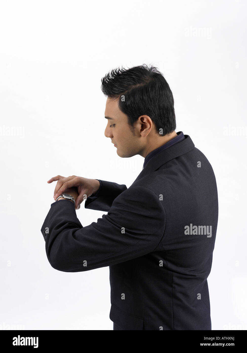 businessman checking his watch Stock Photo - Alamy