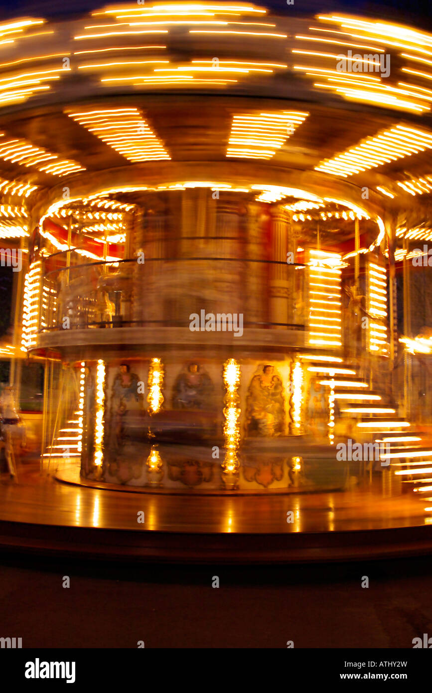 trails of light of a carousel rotating Stock Photo - Alamy