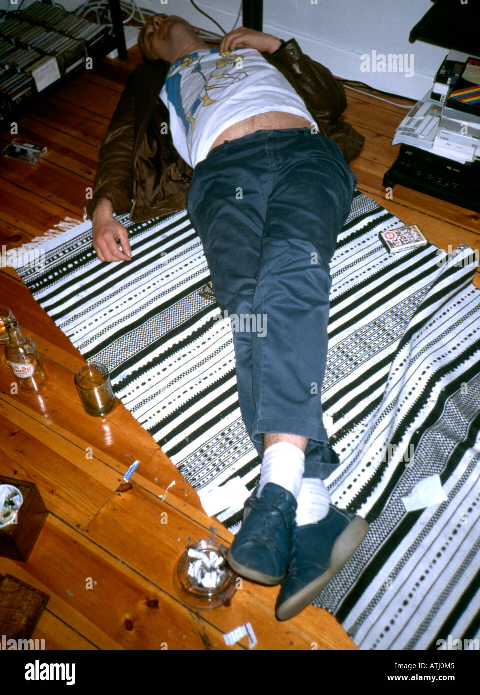 Binge drinker crashed out Stock Photo - Alamy