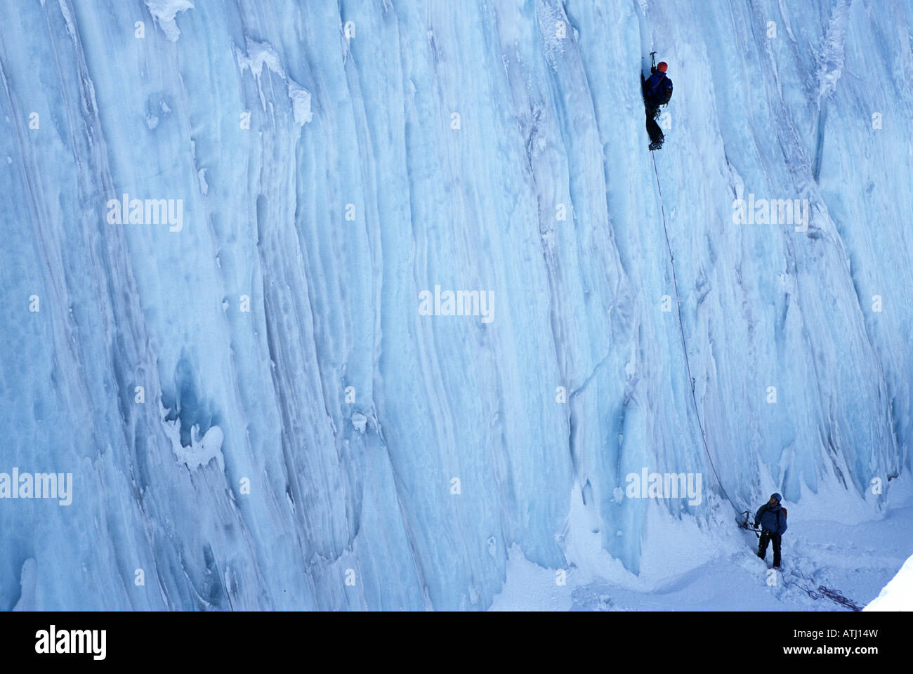 Ice climbing on glacier Stock Photo - Alamy