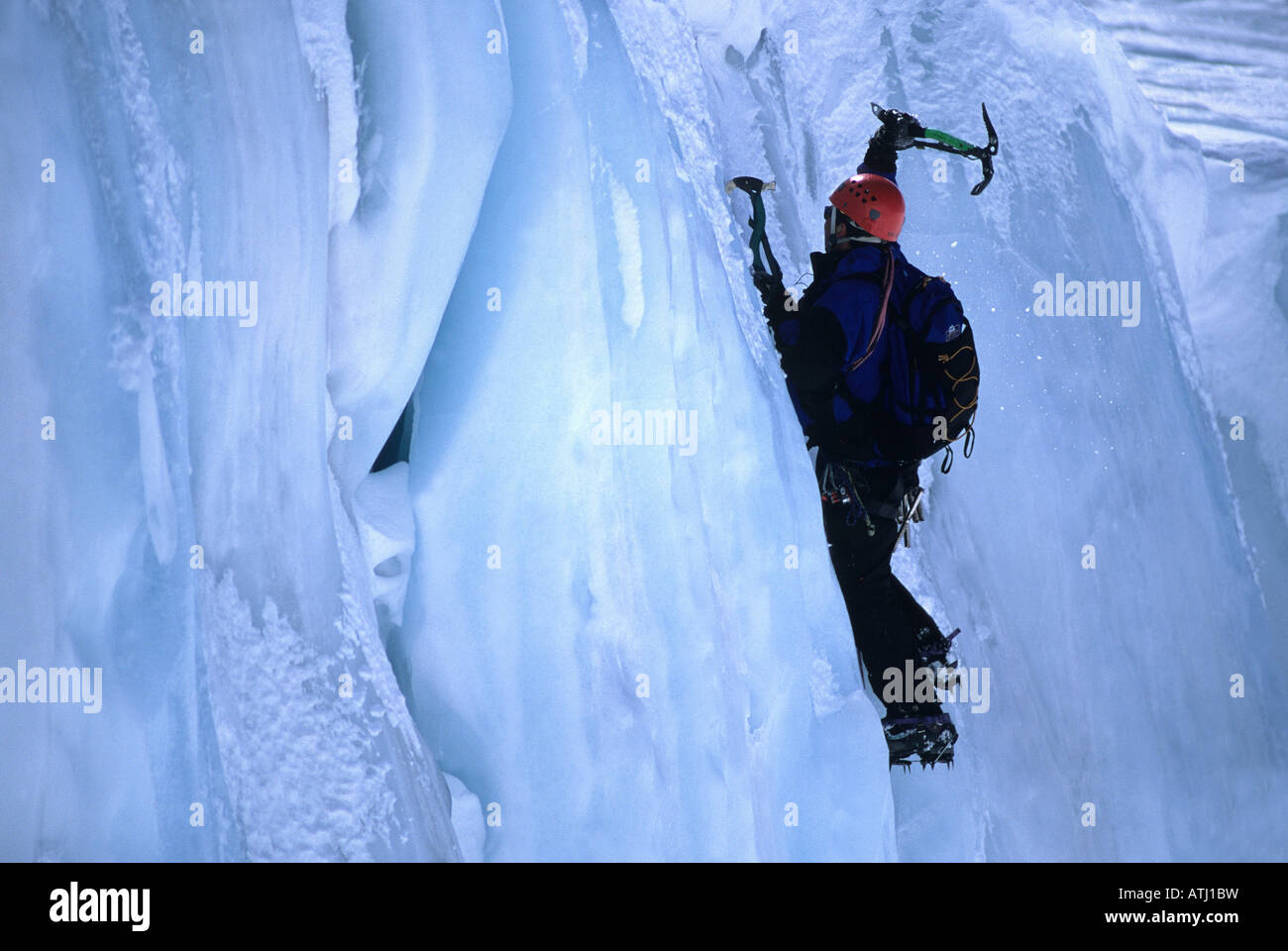 Ice climbing on glacier Stock Photo - Alamy