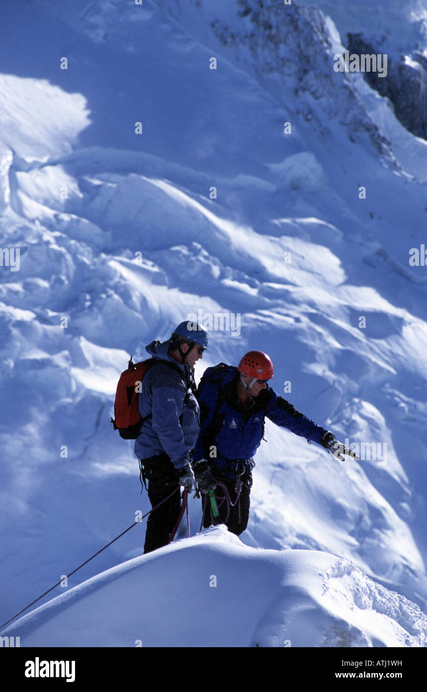 Russell Brice - mountain guide - with client pointing out a feature on ...