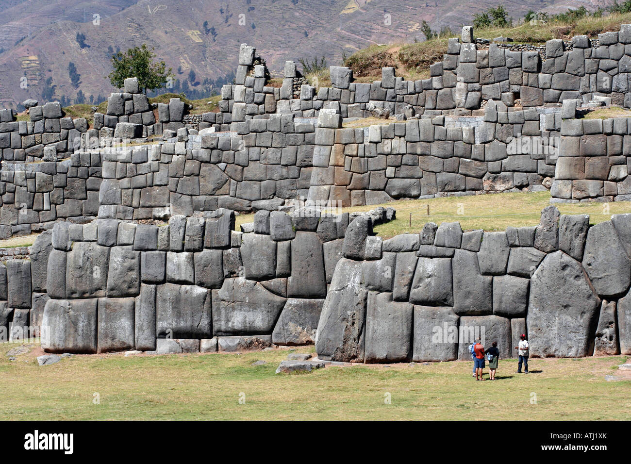 Inca carved stone walls at the military fort of Sacsayhuaman ruins in ...
