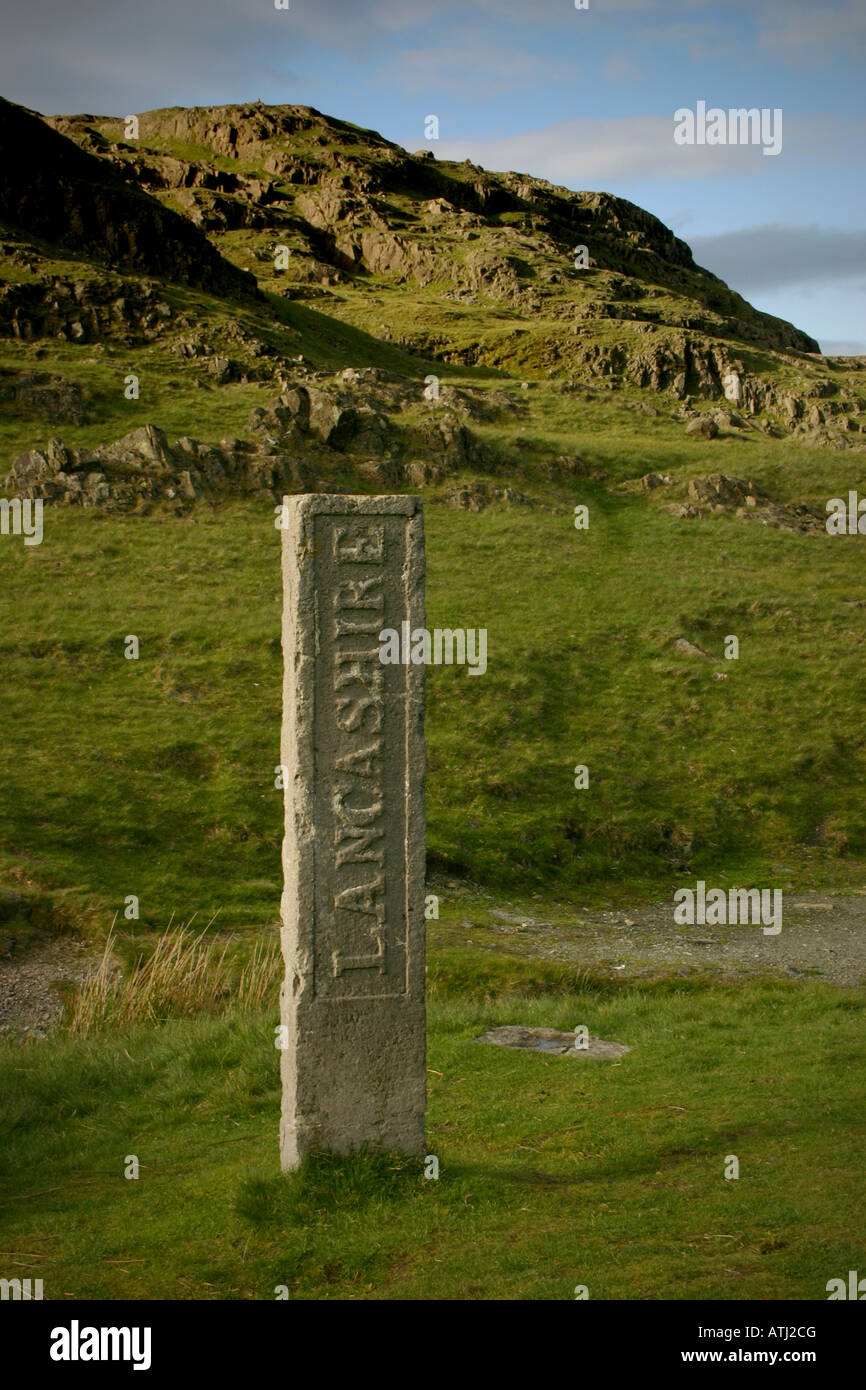 The Three Shire Stone at top of Wrynose Pass in the lake district ...
